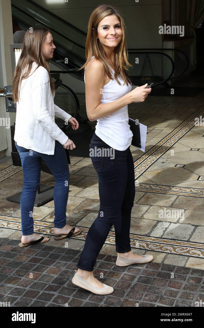 "Extra" host Maria Menounos waves to cameras as she heads to work at ...