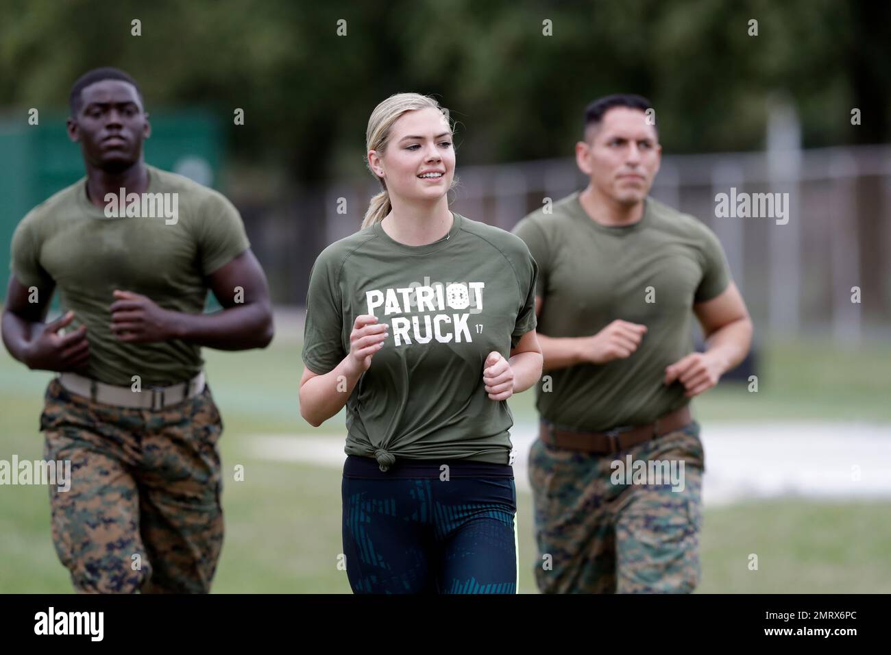 Model and actress Kate Upton takes part in a "workout with the Marines ...