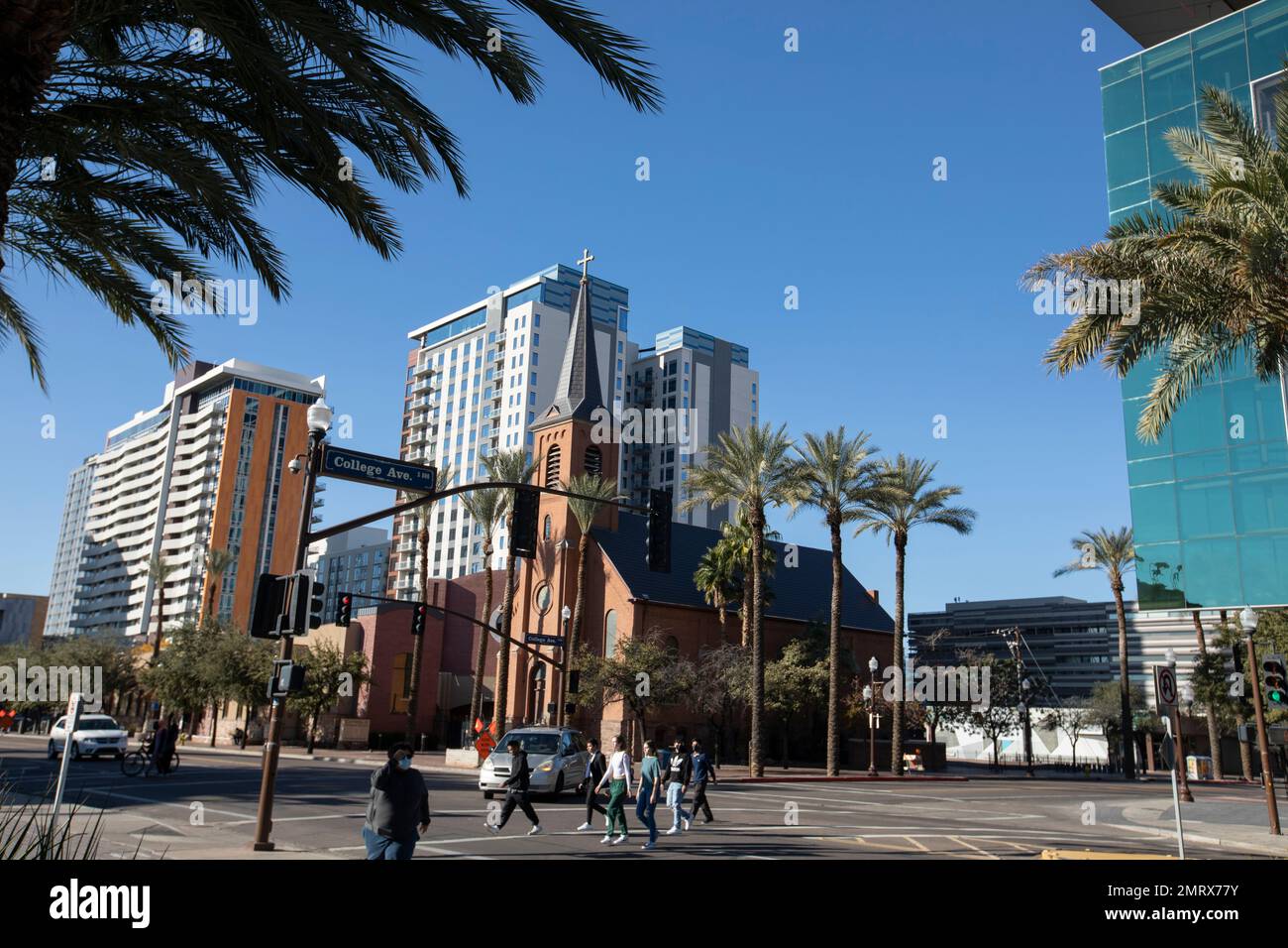 Tempe, Arizona, USA - January 4, 2022: Pedestrians cross a street in ...