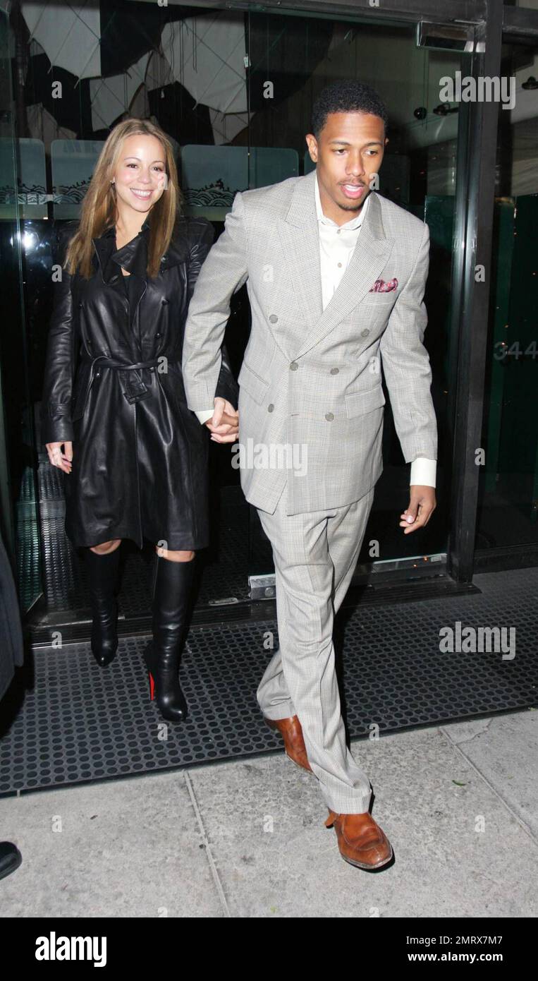 Songbird Mariah Carey and husband Nick Canon leave the restaurant Mr ...