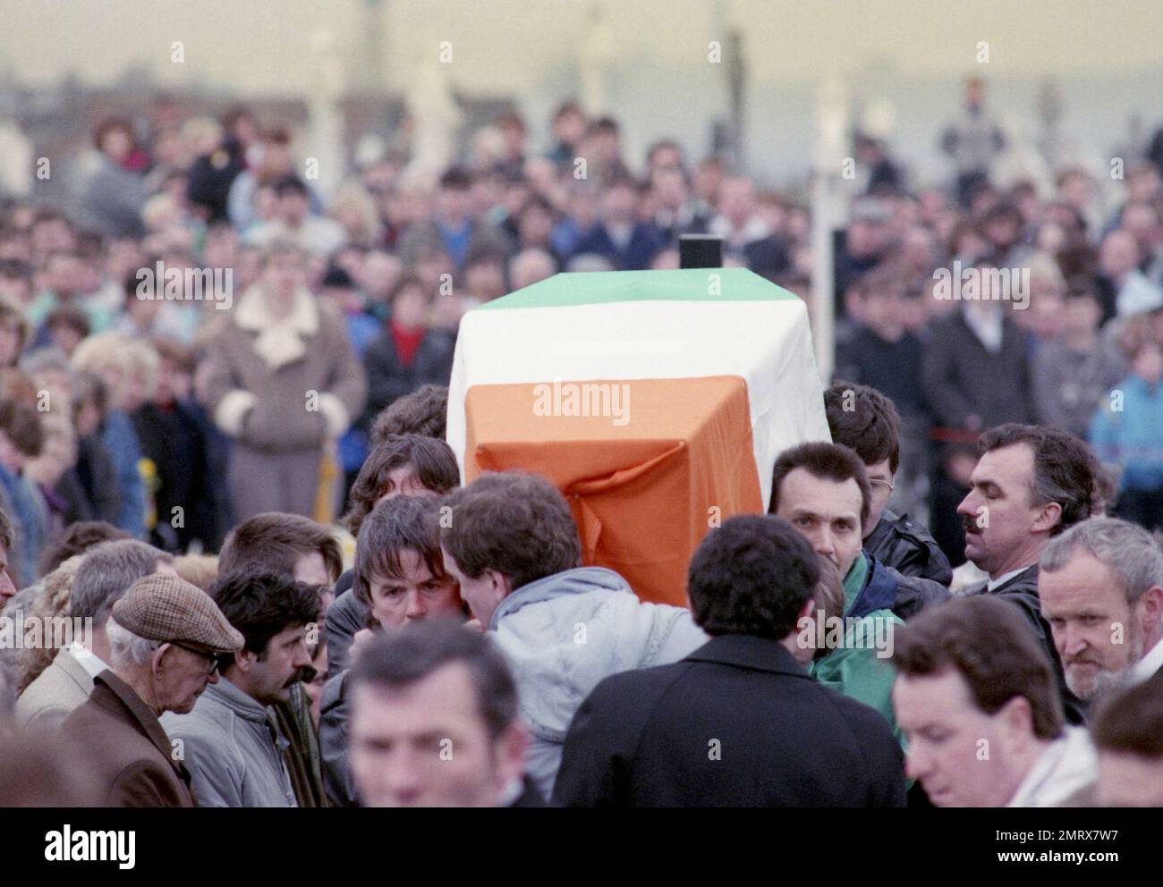 Mourners carry a coffin at the funeral for Sean Savage, Daniel McCann ...