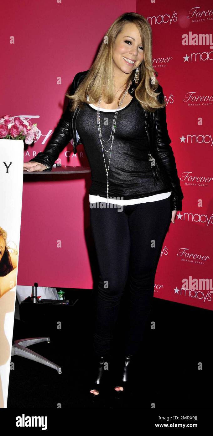 Mariah Carey, wearing an all-black outfit, launches her new fragrance ...
