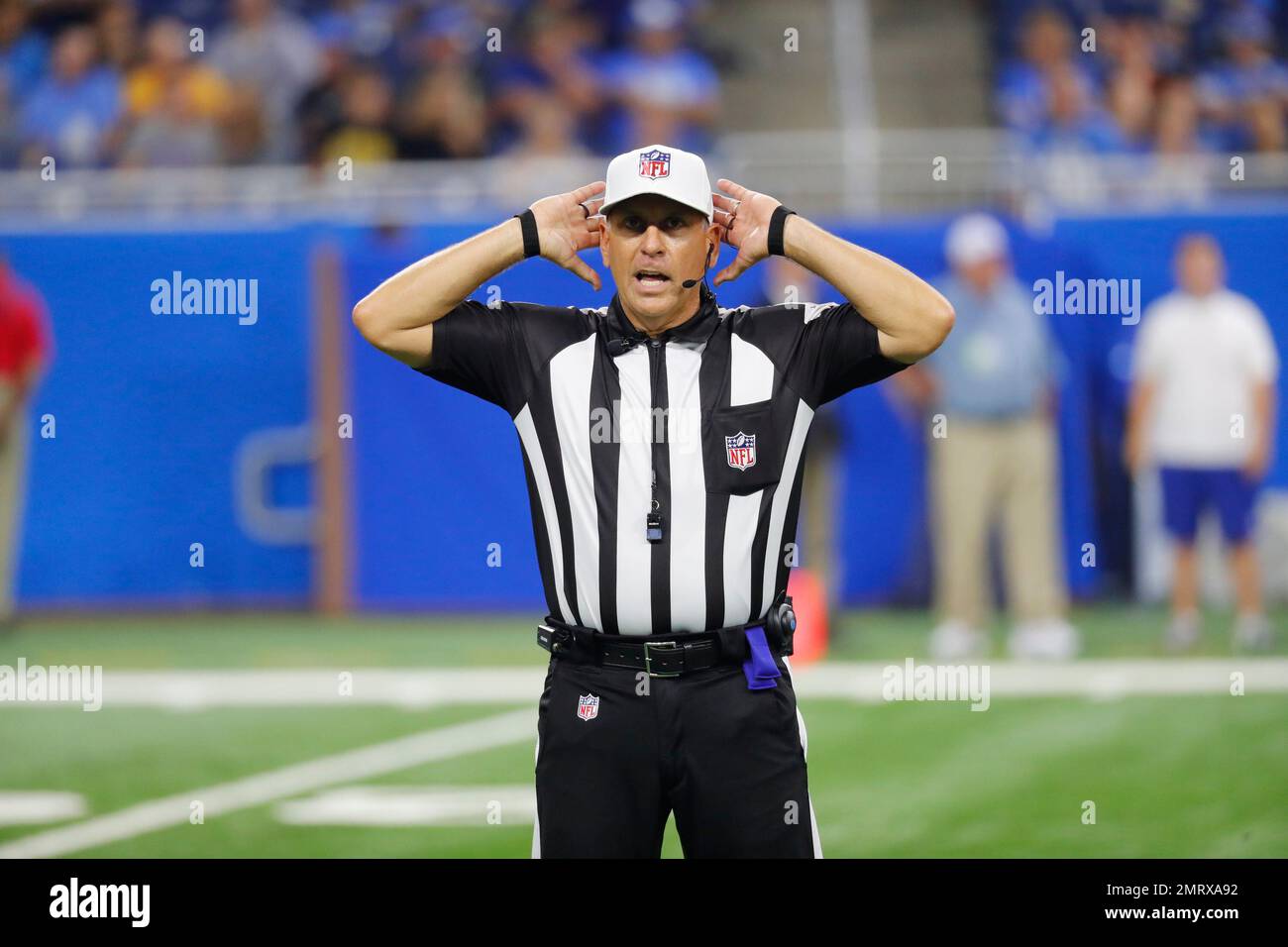 Referee John Hussey signals during a preseason NFL football game ...