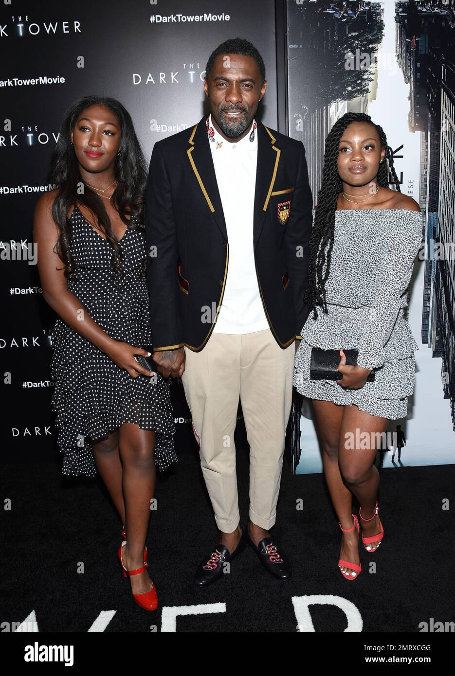 British actor Idris Elba, center, and daughter Isan Elba, left, attend ...