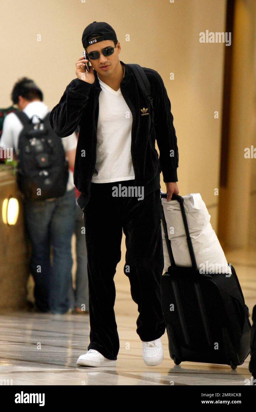 Exclusive!! Mario Lopez seems all about comfort as he arrives at LAX ...