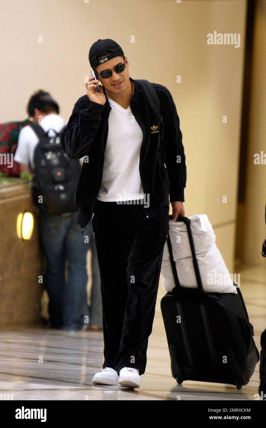 Exclusive!! Mario Lopez seems all about comfort as he arrives at LAX ...