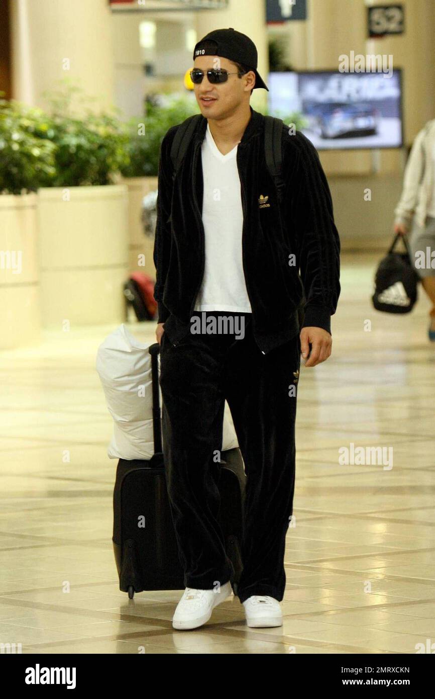 Exclusive!! Mario Lopez seems all about comfort as he arrives at LAX ...