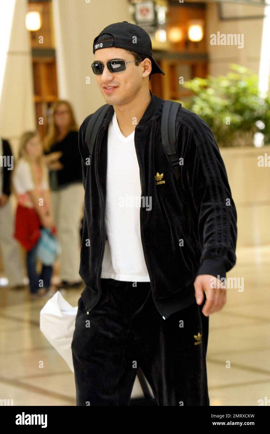 Exclusive!! Mario Lopez seems all about comfort as he arrives at LAX ...