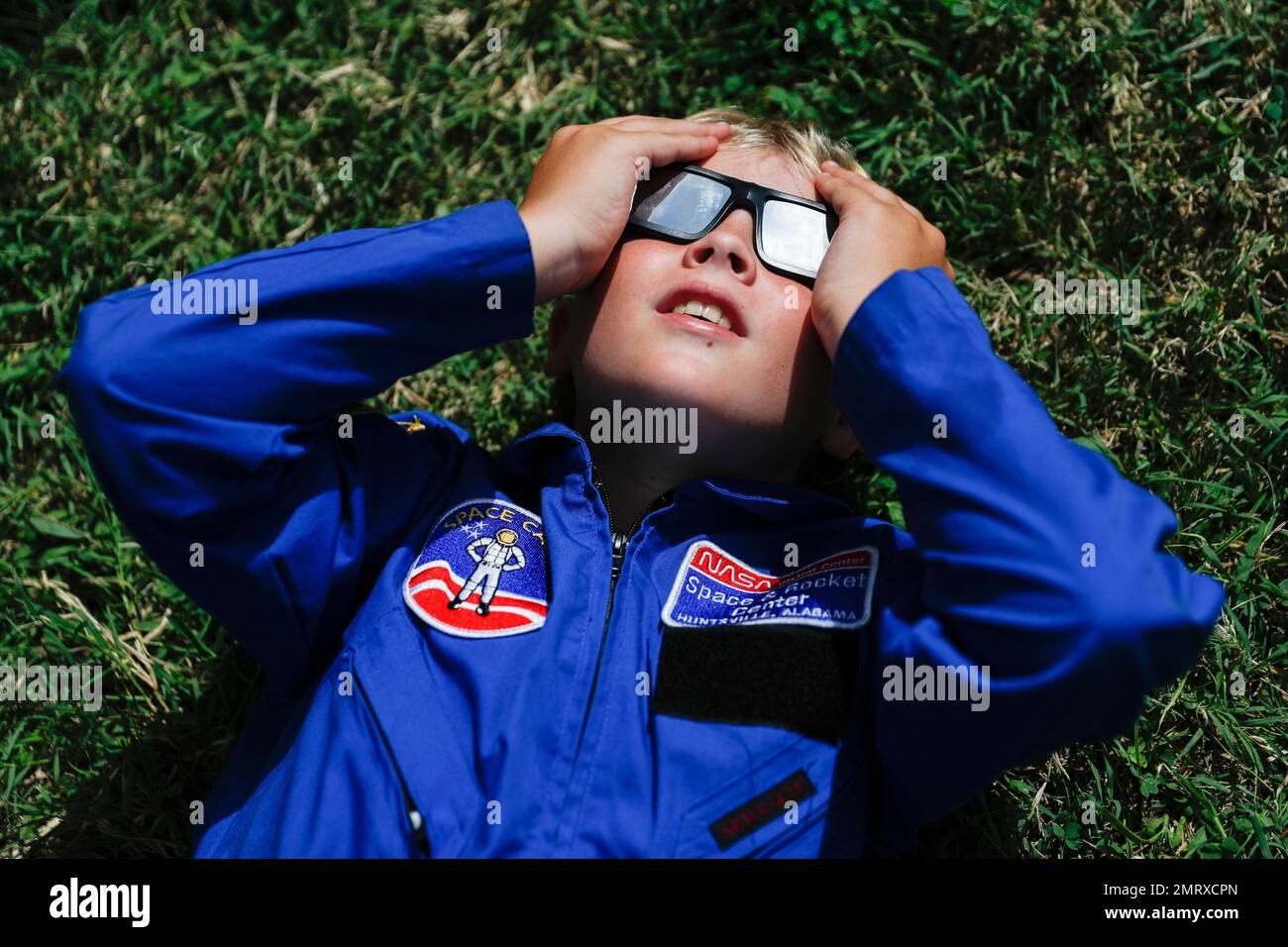Tyler Hanson, of Fort Rucker, Ala., watches the sun moments before the ...