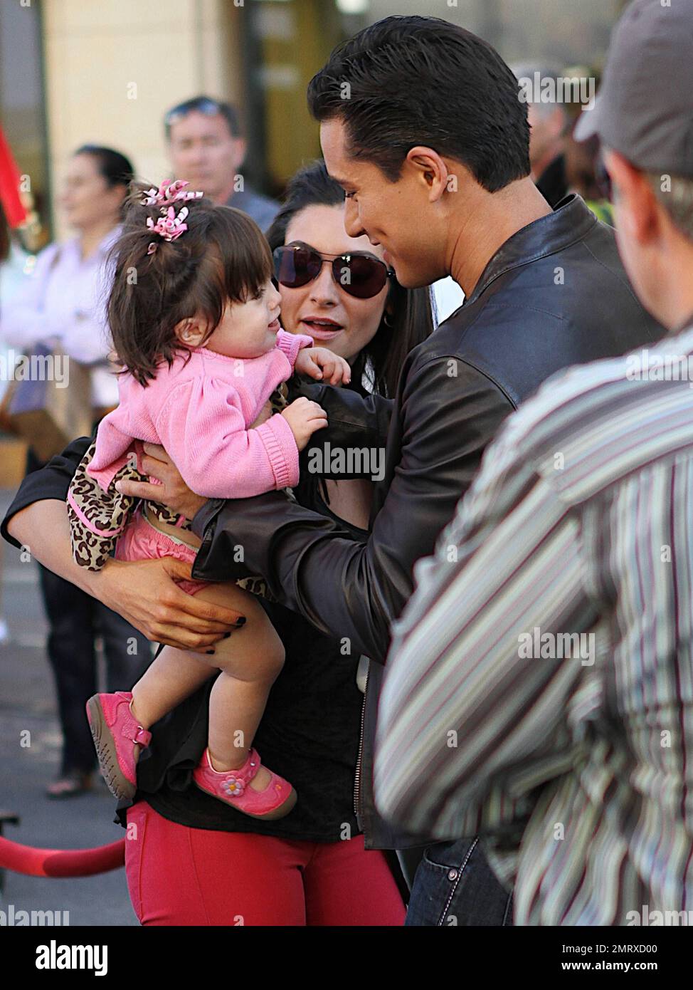'Extra' host Mario Lopez takes a break from taping the show at The ...