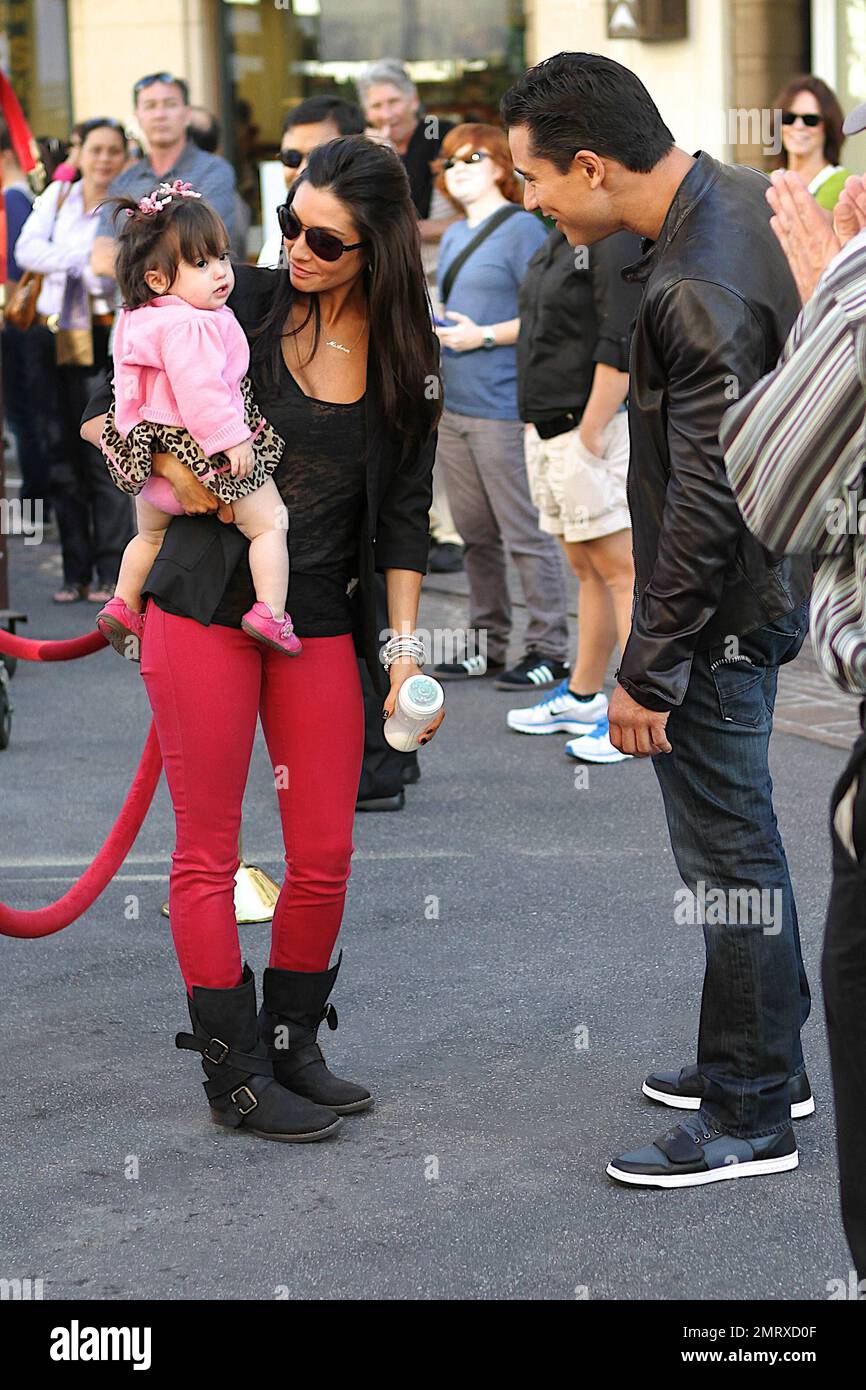 'Extra' host Mario Lopez takes a break from taping the show at The ...