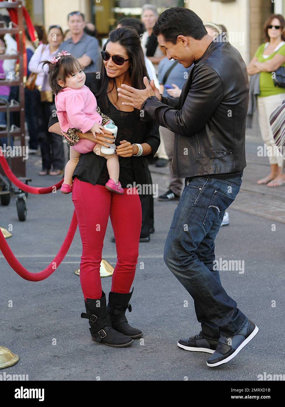 'Extra' host Mario Lopez takes a break from taping the show at The ...