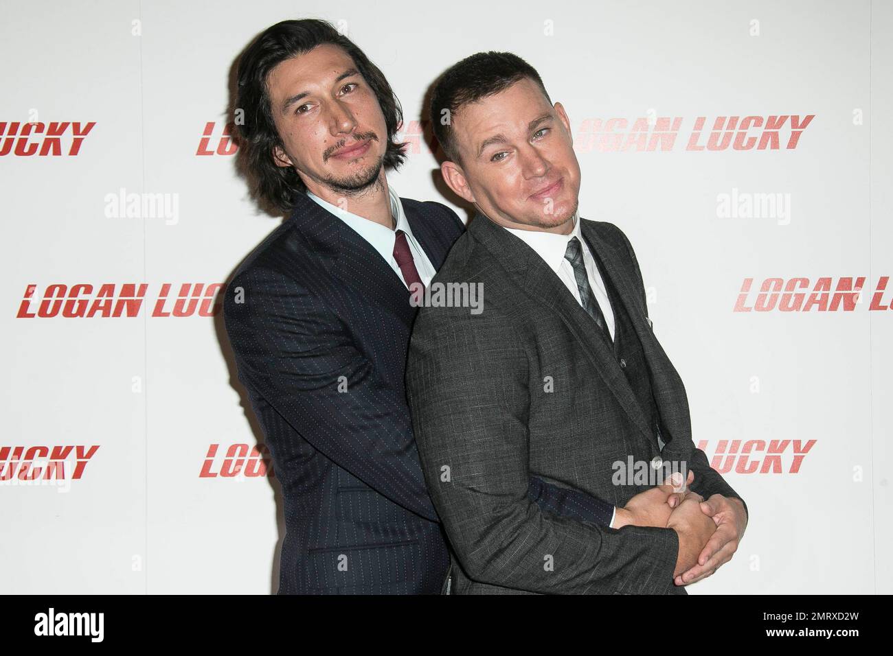 Actors Adam Driver, left and Channing Tatum embrace as they pose for ...