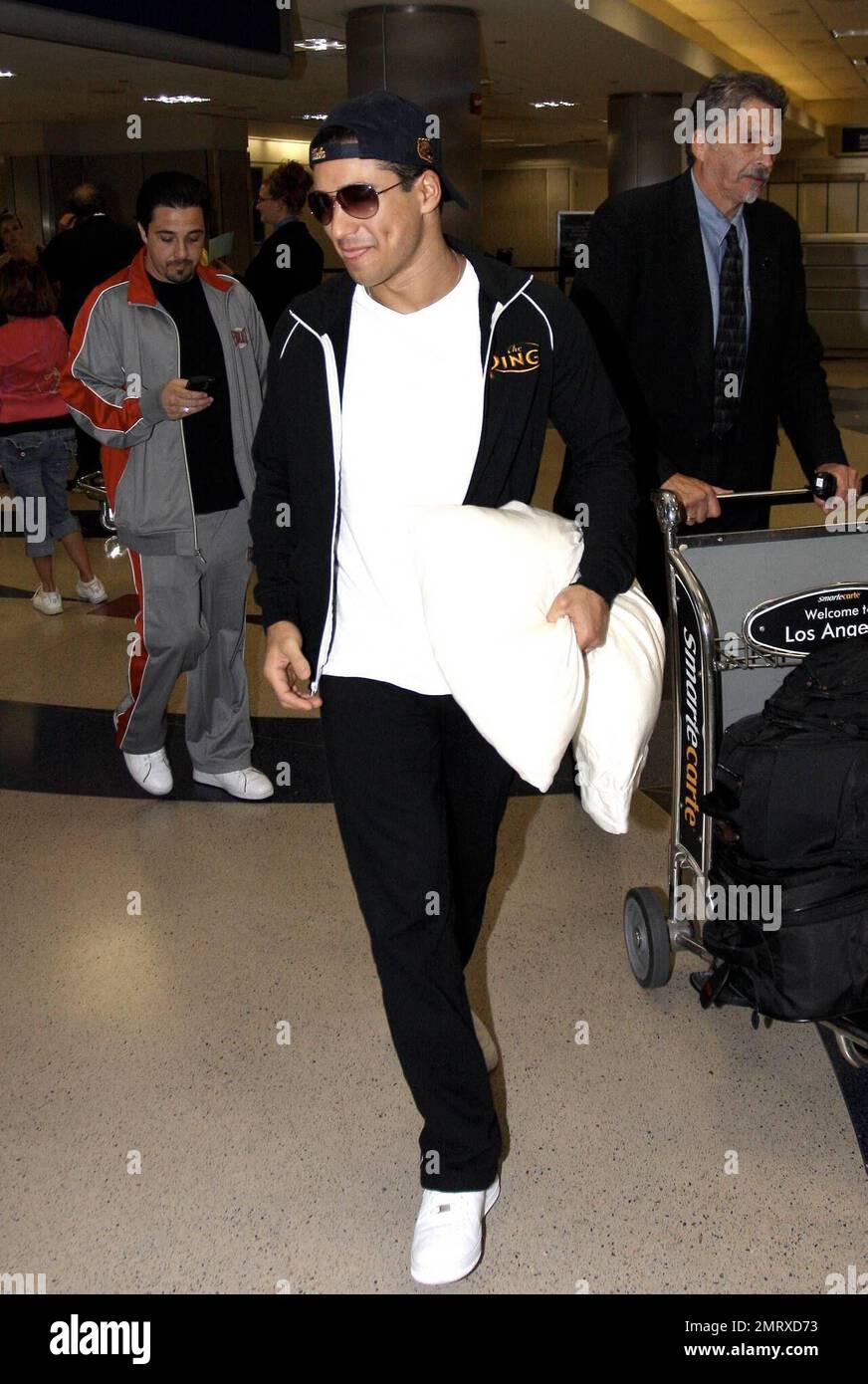 Mario Lopez arrives home in Los Angeles after a visit to Miami for the ...