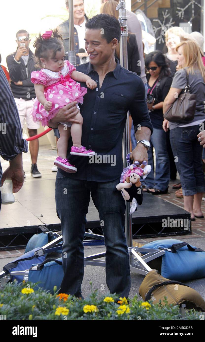 Mario Lopez and Courtney Mazza show off their daughter Gia in her ...
