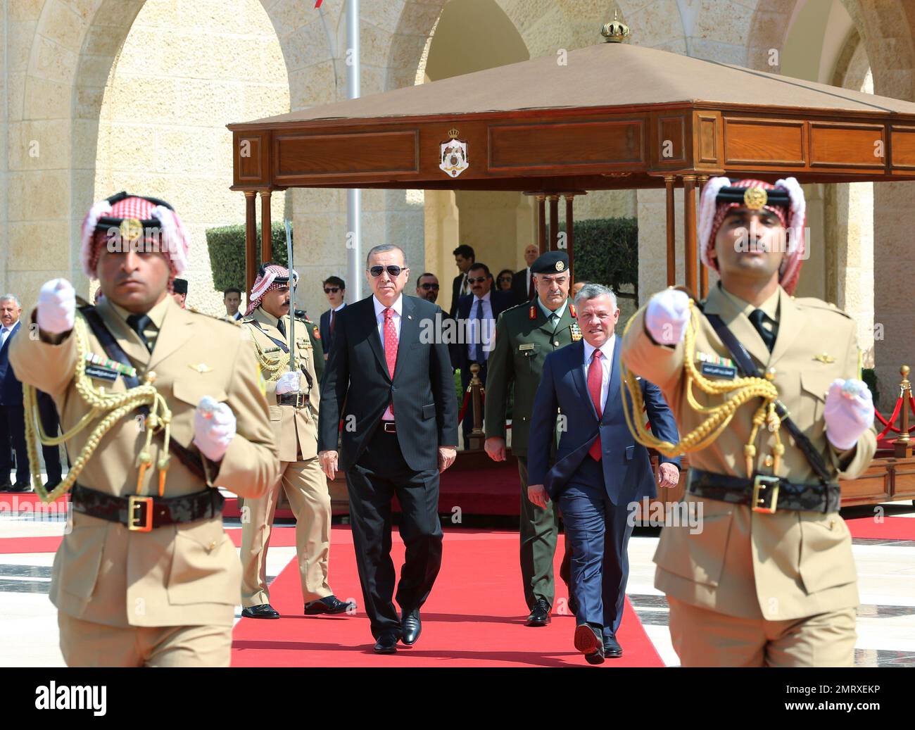 Jordan's King Abdullah II, centre right, walks with Turkey's President ...