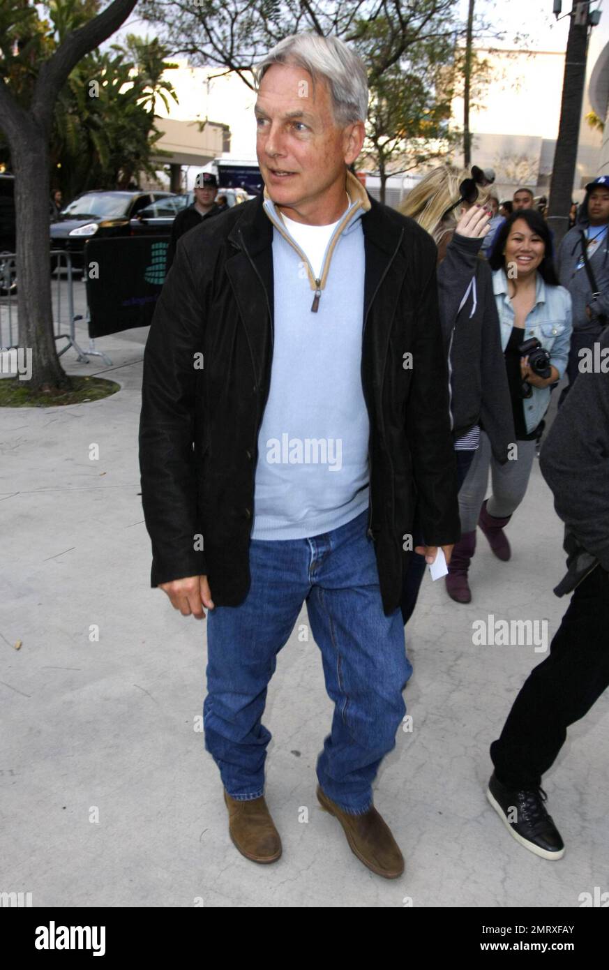 TV actor Mark Harmon arrives at the Staples Center with a friend to ...