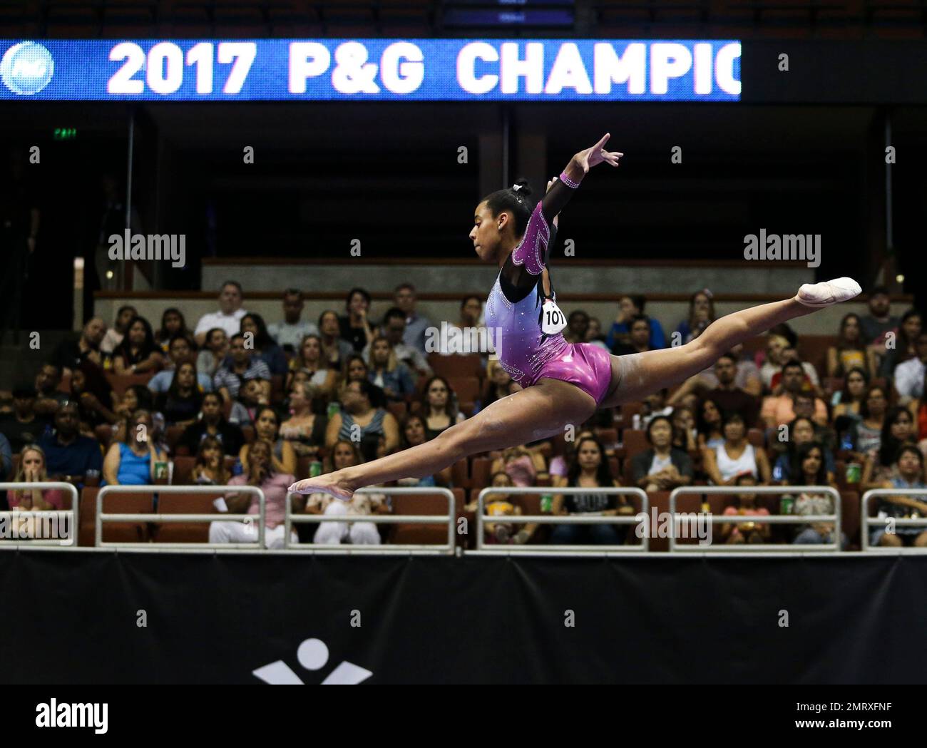Shania Adams competes on the balance beam during senior women's opening ...