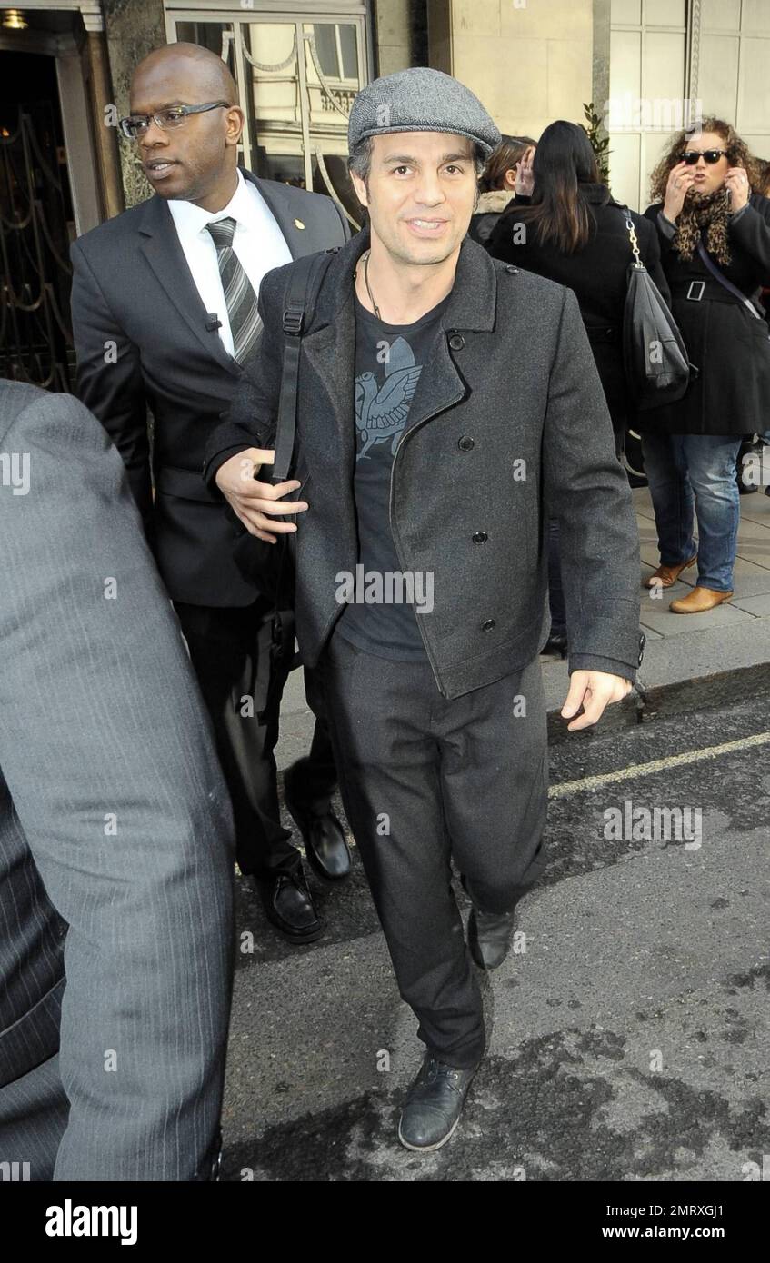 "The Kids Are Alright" star Mark Ruffalo flashes a peace sign while ...