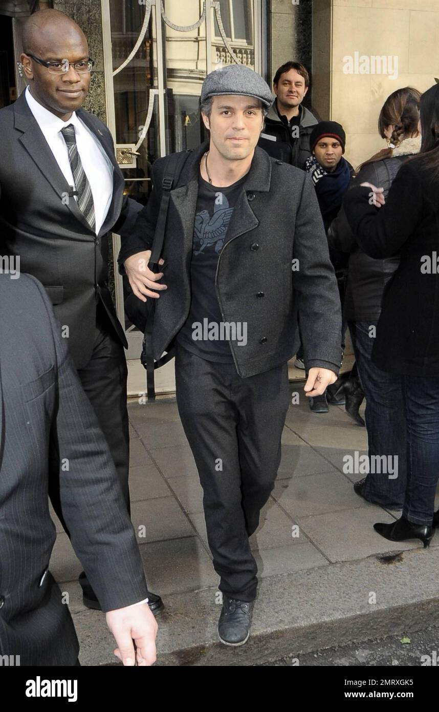 "The Kids Are Alright" star Mark Ruffalo flashes a peace sign while ...