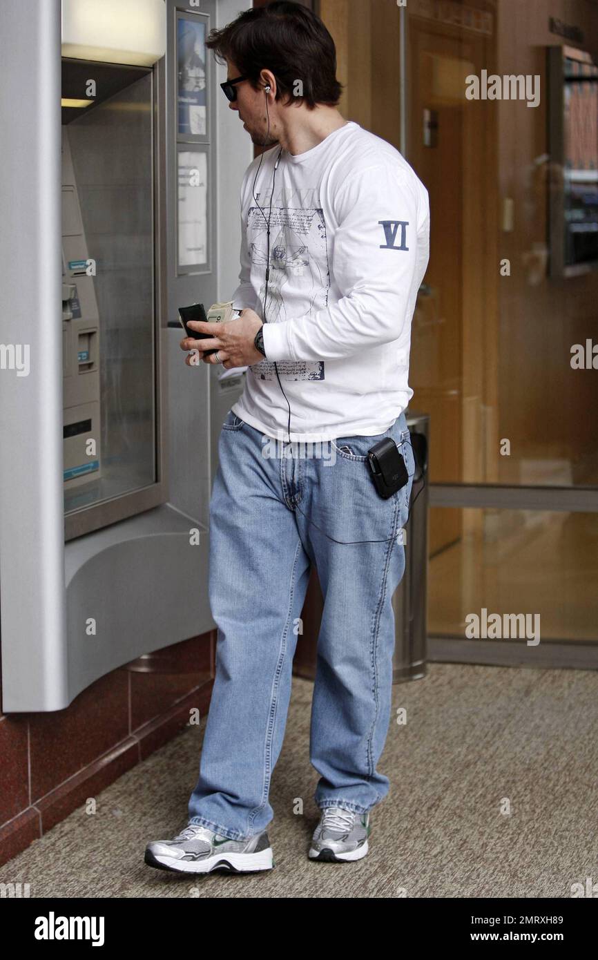 Mark Wahlberg stops for some cash at an ATM in Beverly Hills, CA. 1/4 ...