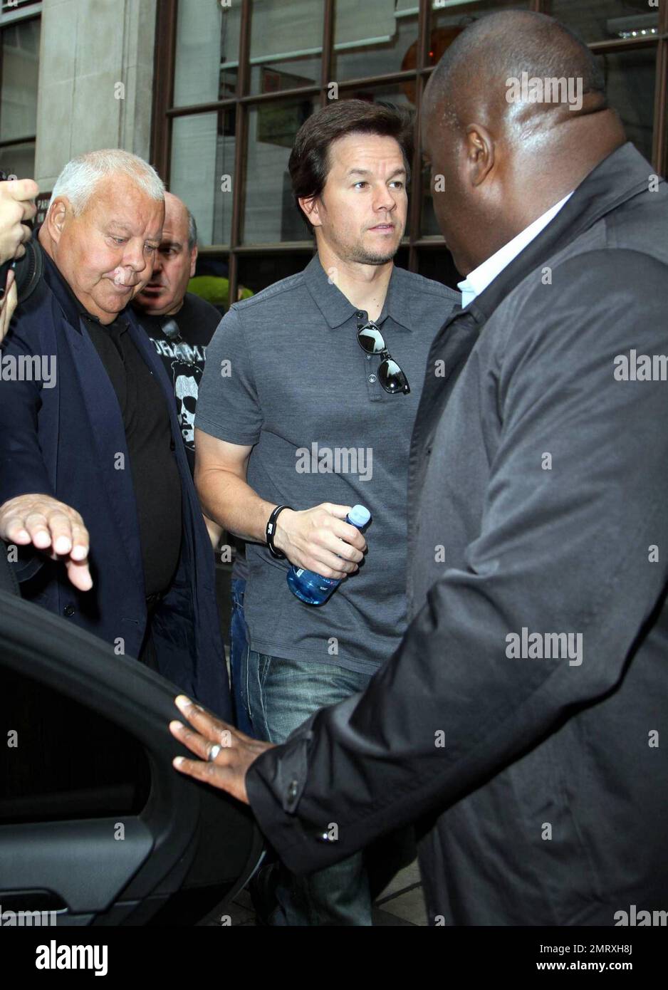 Hunky actor Mark Wahlberg leaves BBC Radio 1 after making an appearance ...