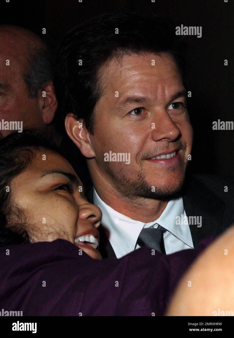 Mark Wahlberg signs autographs for and poses for photos with fans ...