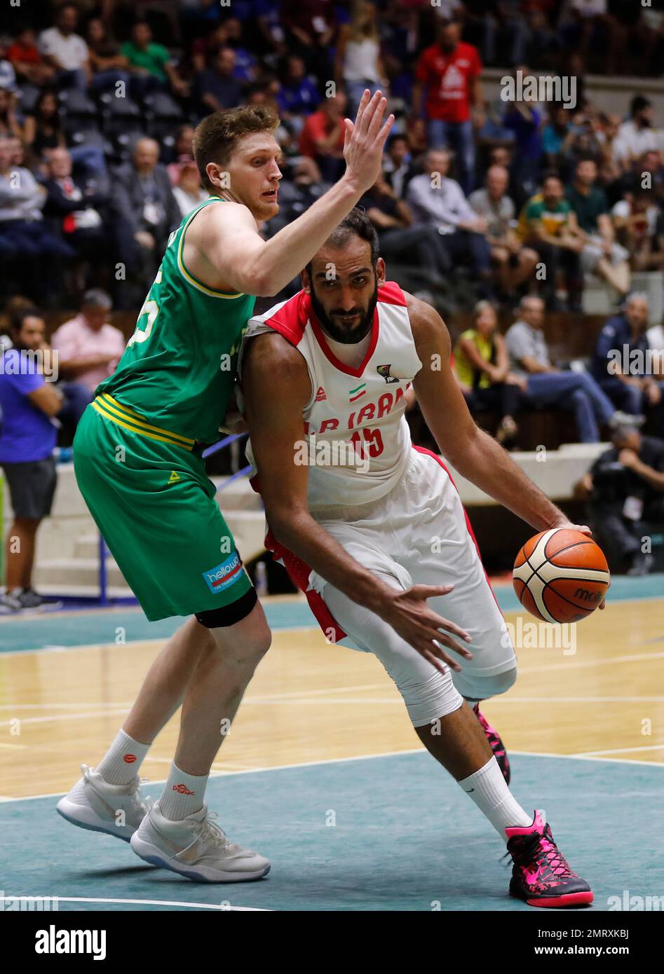 Iran's Hamed Haddadi, right, challenges against Australia's Matthew ...