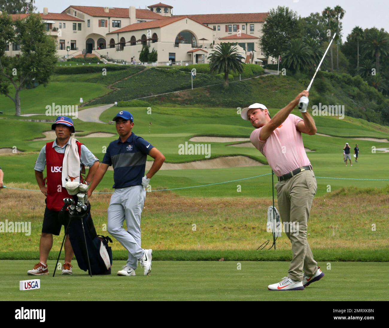 Doc Redman hits off the 14th tee during the championship round of the ...