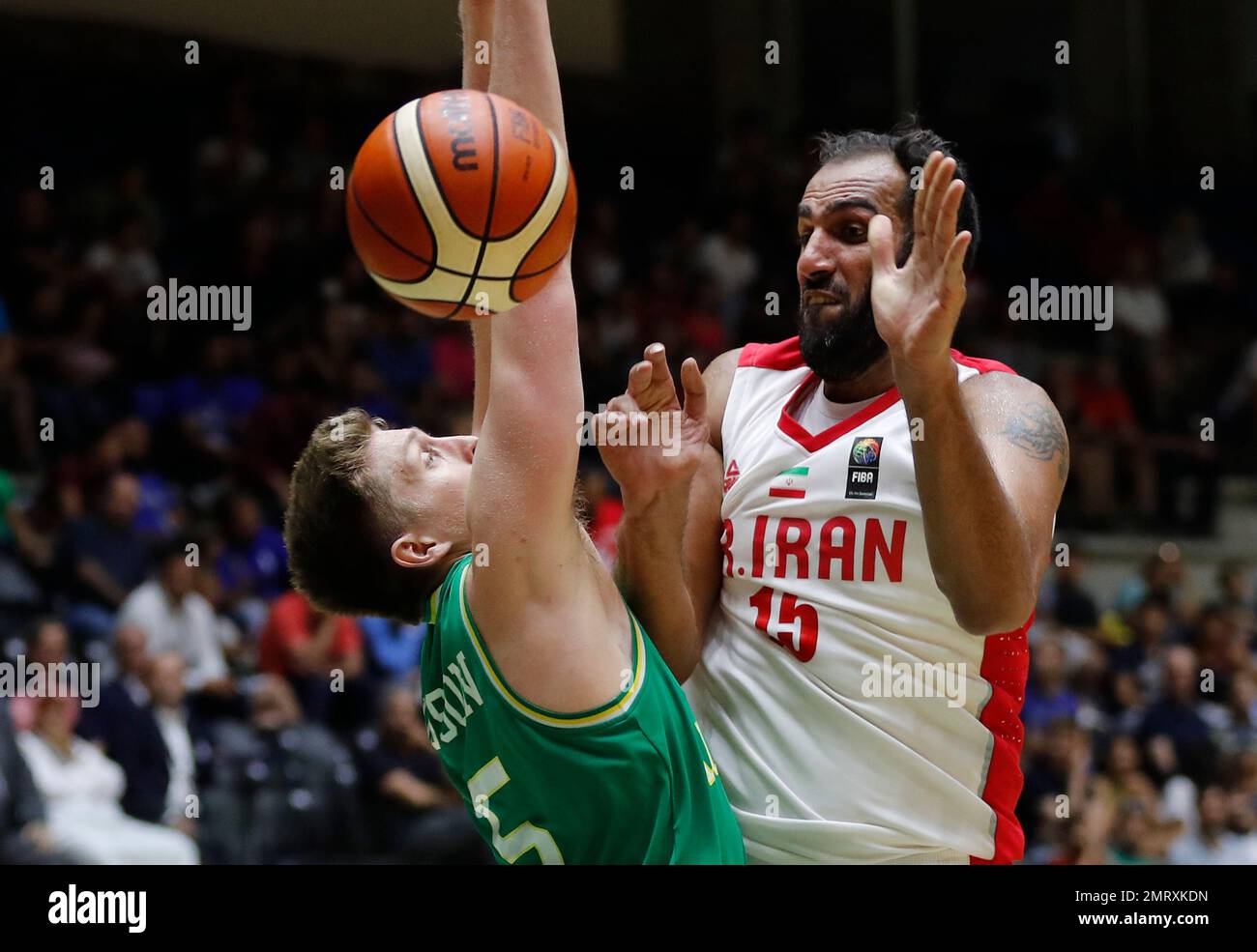 Iran's Hamed Haddadi, right, challenges Australia's Matthew Hodgson ...