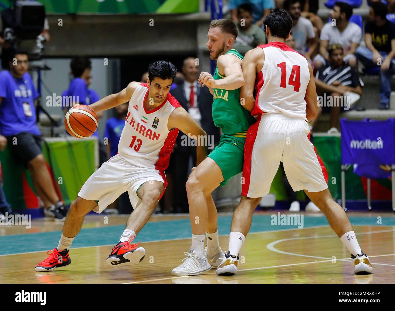 Iran's Mohammad Jamshidi, left, challenges Australia's Mitch Greek for ...