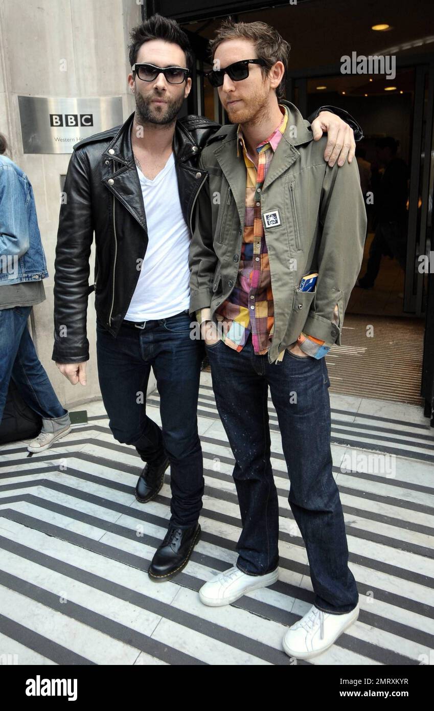 Maroon 5's Adam Levine and Jesse Carmichael pose for photos outside the ...