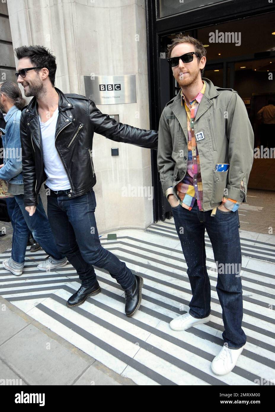 Maroon 5's Adam Levine and Jesse Carmichael pose for photos outside the ...