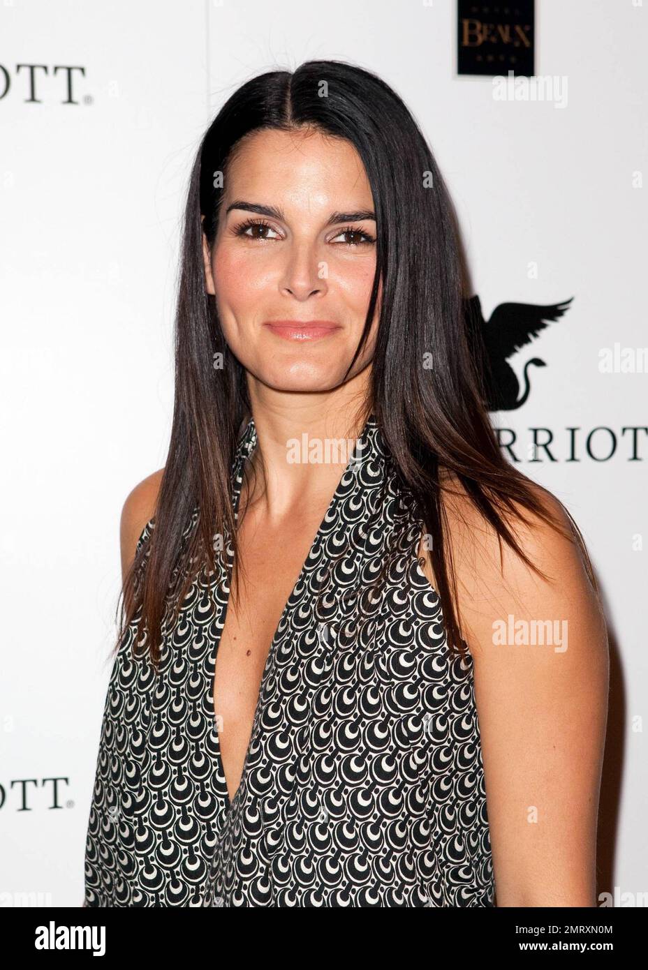 American actress Angie Harmon walks the red carpet at the grand opening ...
