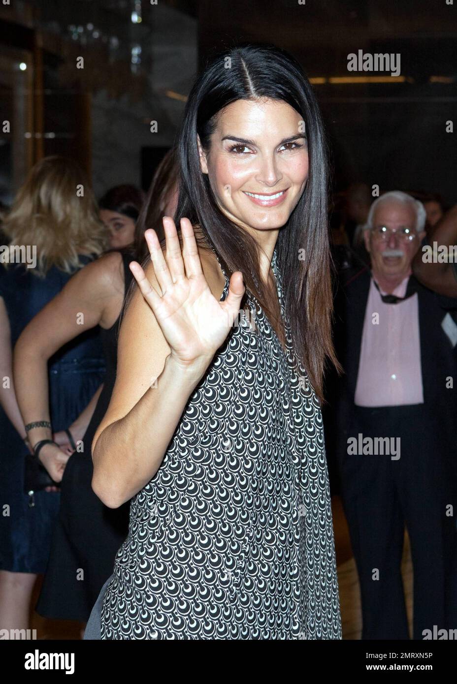 American actress Angie Harmon walks the red carpet at the grand opening ...