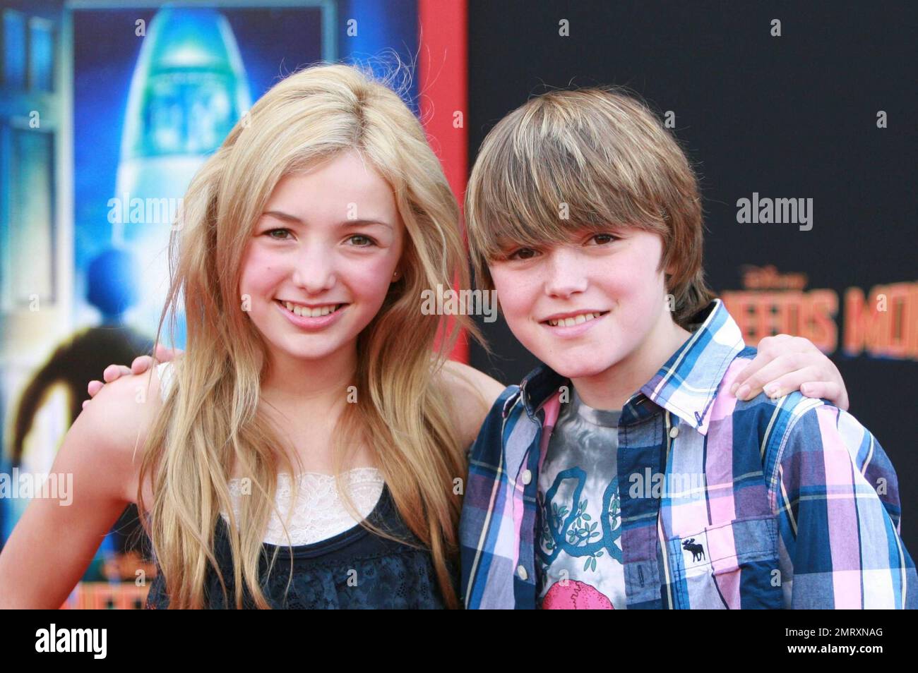 Peyton and Spencer List pose for photographers on the red carpet at the premiere of Walt Disney ...