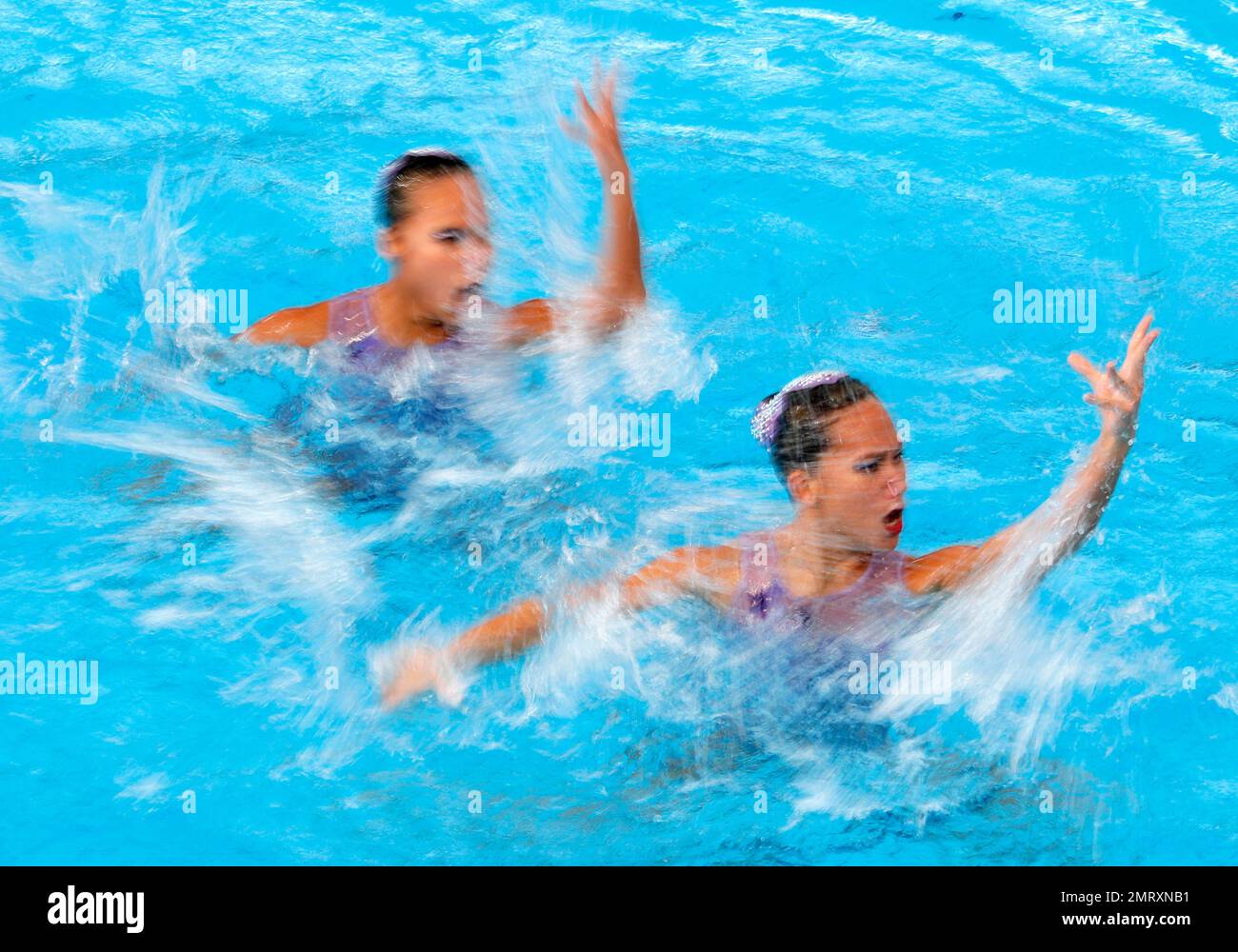 Malaysia's Gan Hua Wei, right, and Lee Ying Huey compete during the Duet Free Routine ...