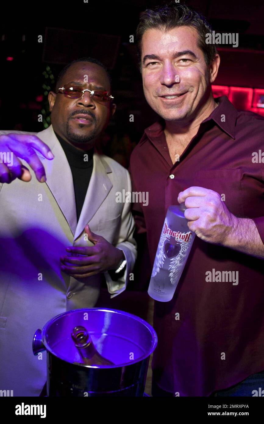 Comedian Martin Lawrence poses for photos in the VIP room at Infusion ...