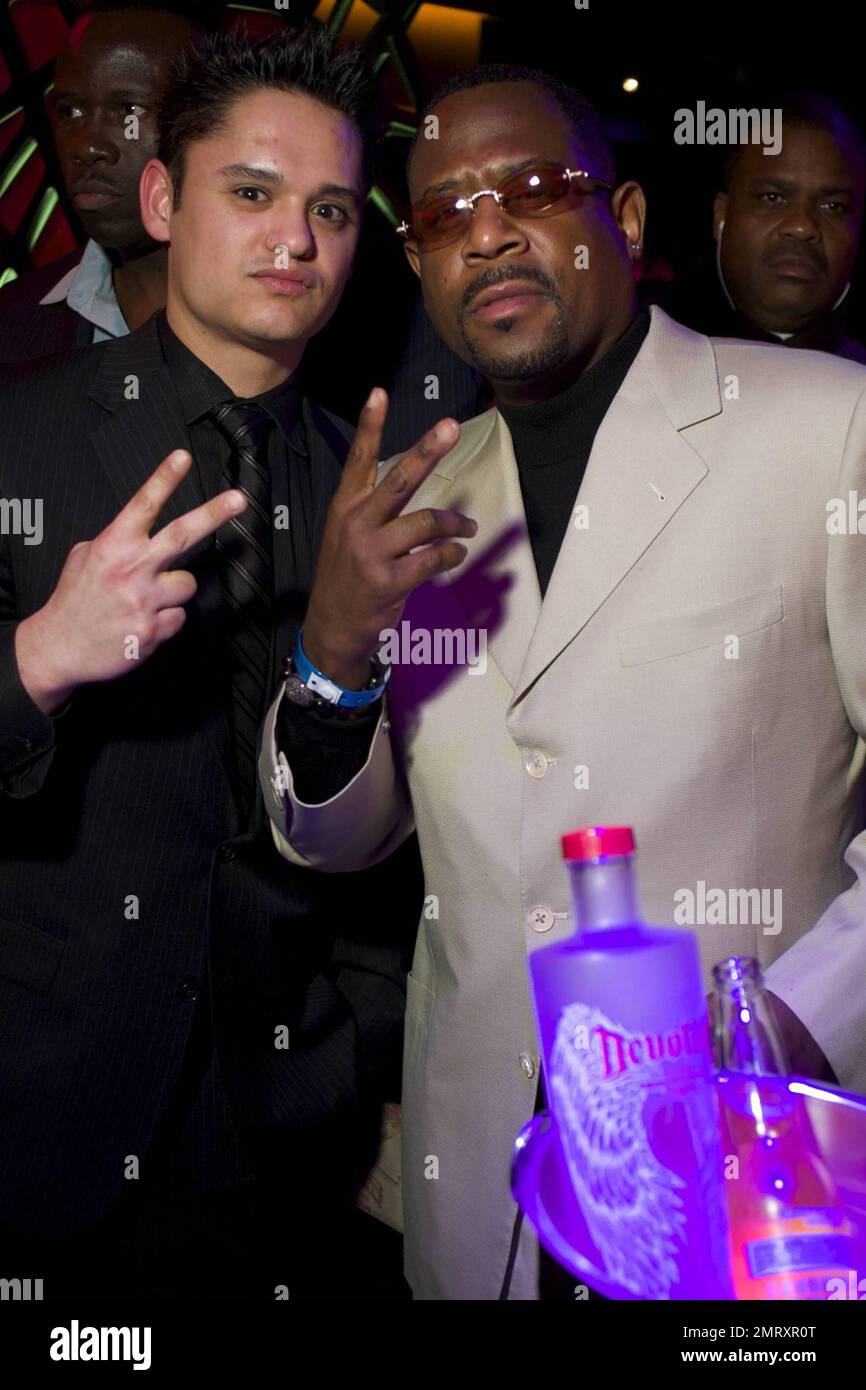 Comedian Martin Lawrence poses for photos in the VIP room at Infusion ...