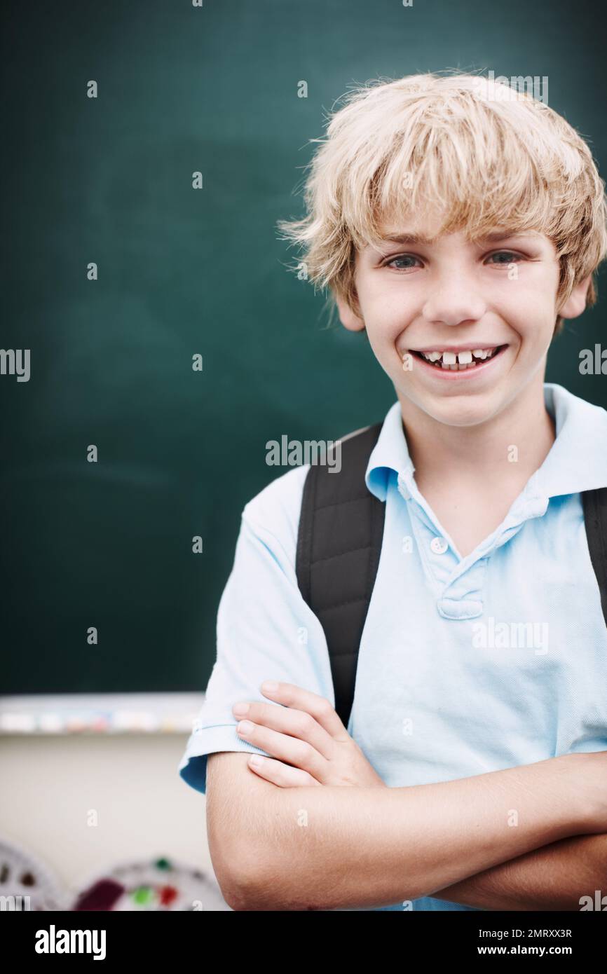 His marks are always great. A happy young boy crossing his arms and ...