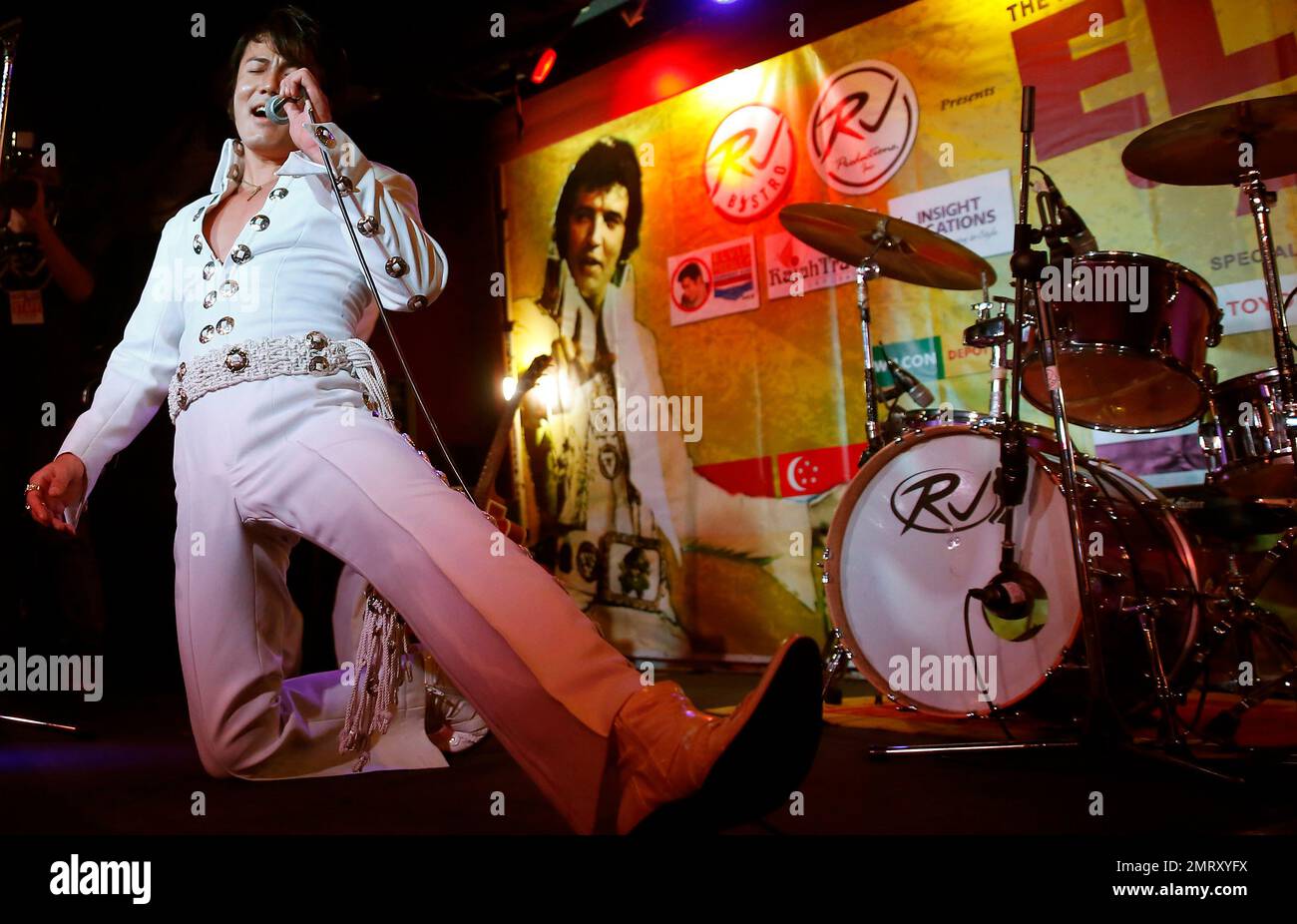 Elvis impersonator Yukihiro Nishijima of Japan performs during the ...