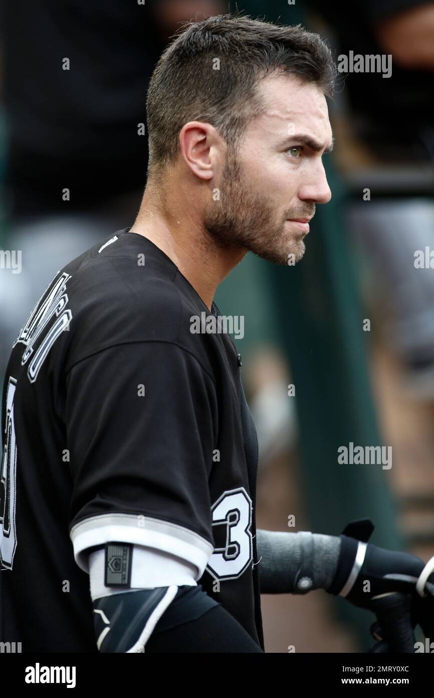 Chicago White Sox' Nicky Delmonico waits in the dugout before the start ...