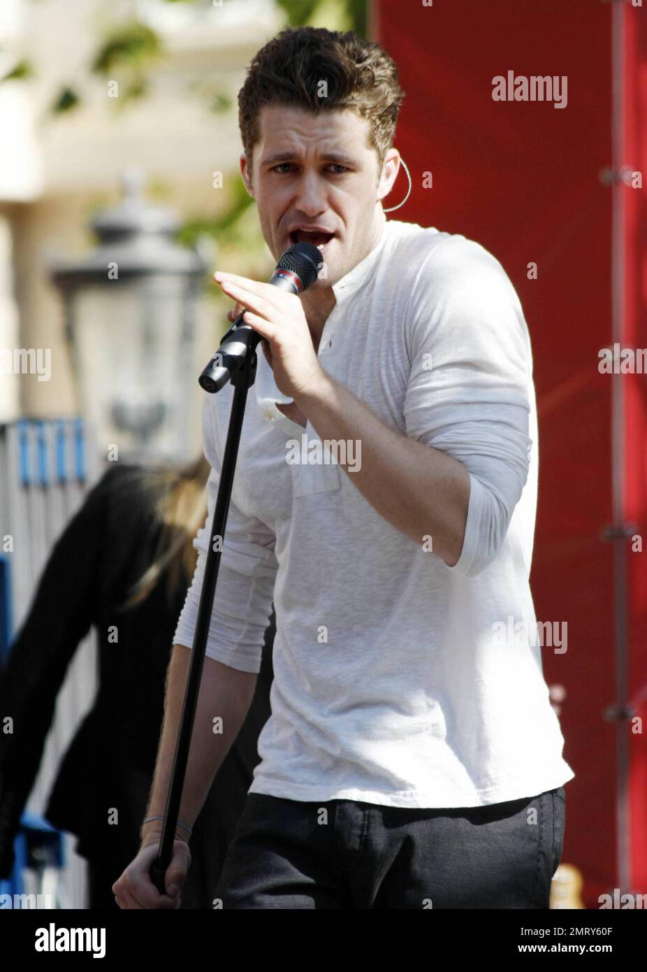 "Glee" actor Matthew Morrison performs solo during a free concert at ...