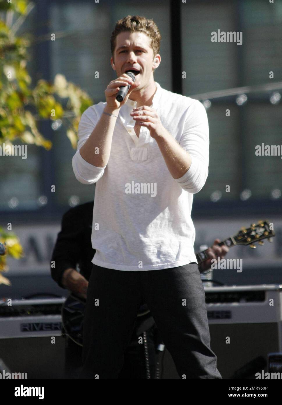 "Glee" actor Matthew Morrison performs solo during a free concert at ...