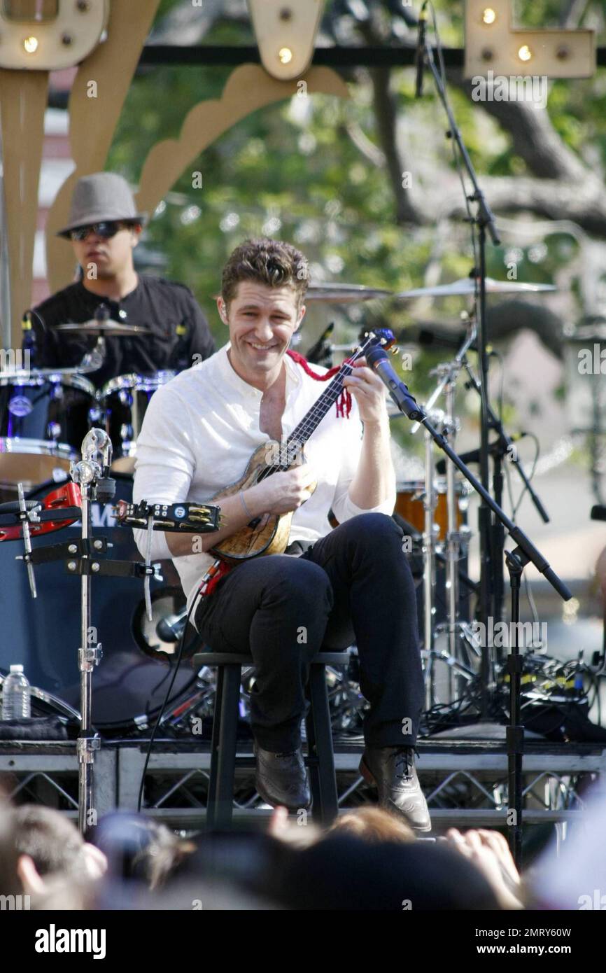 "Glee" actor Matthew Morrison performs solo during a free concert at ...