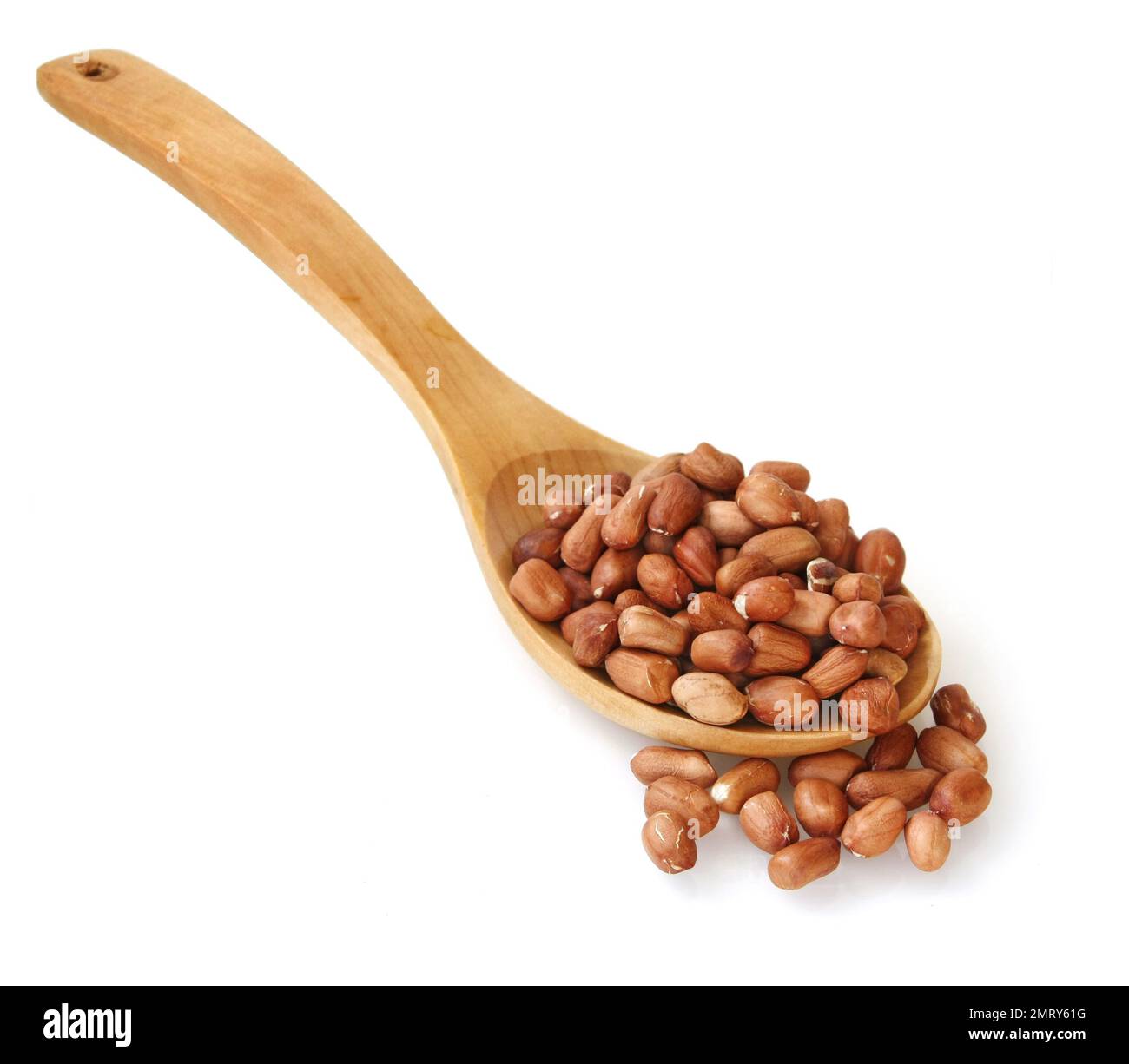 Peanuts in wooden spoon, isolated on white background Stock Photo - Alamy