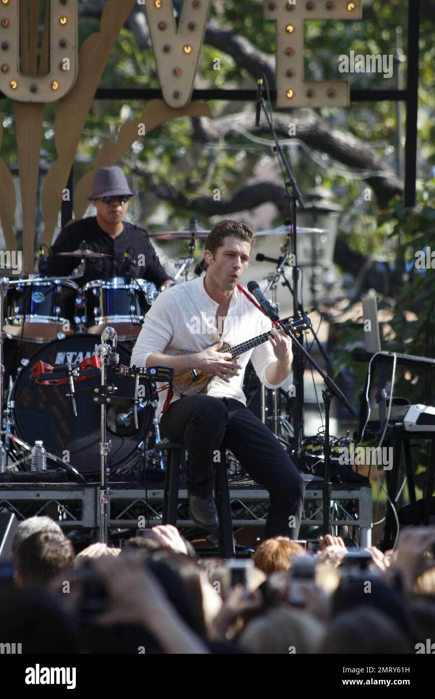 "Glee" actor Matthew Morrison performs solo during a free concert at ...
