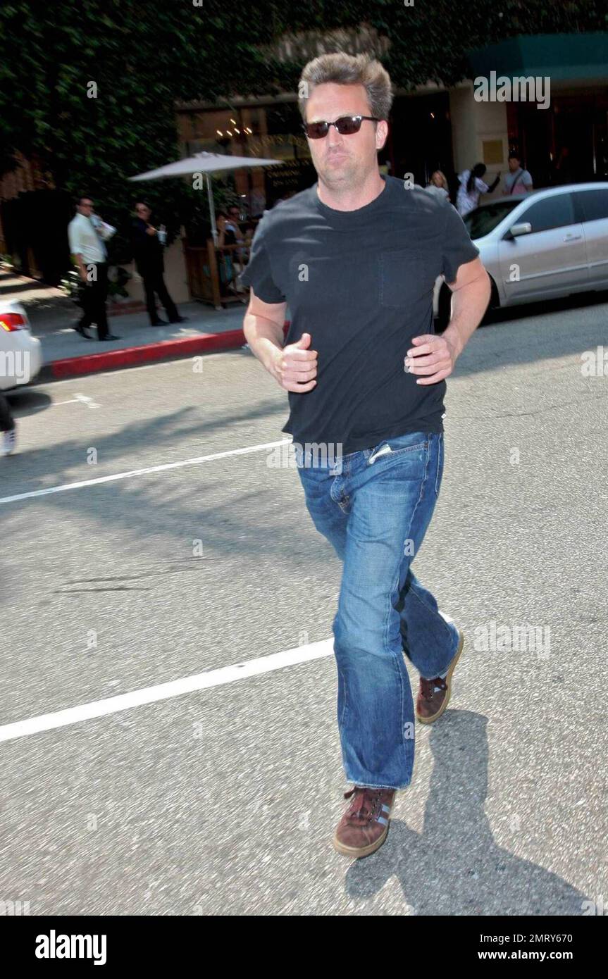 - Matthew Perry must be in a hurry as he runs from the Beverly Hills ...