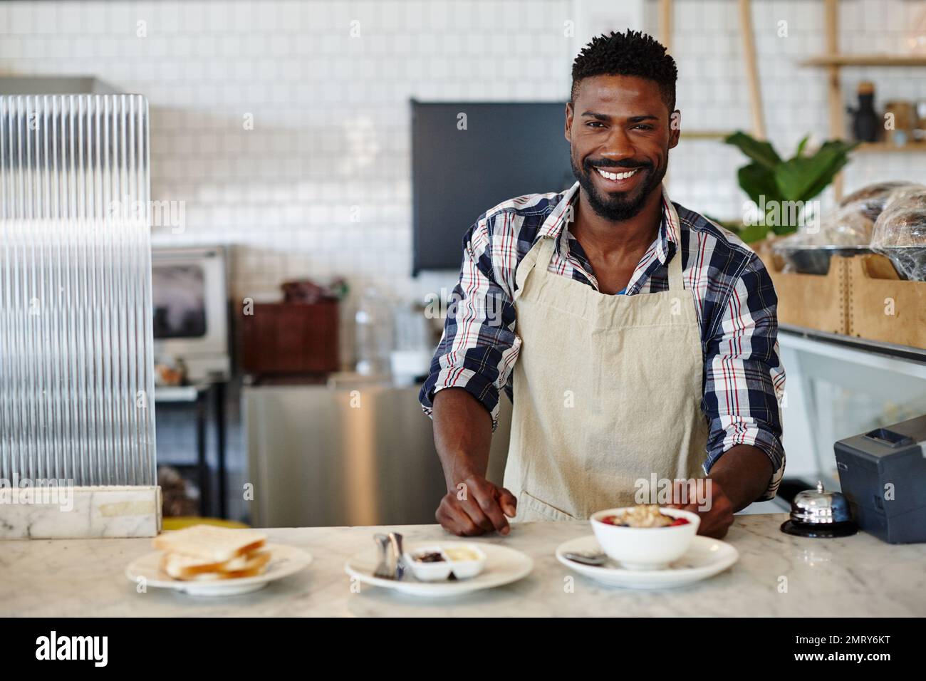 We serve delicious, healthy breakfasts. Cropped portrait of a handsome ...