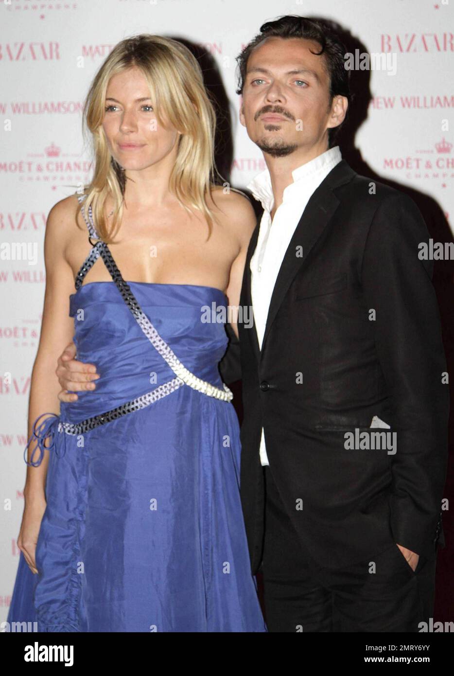 Actress Sienna Miller and fashion designer Matthew Williamson arrive at ...